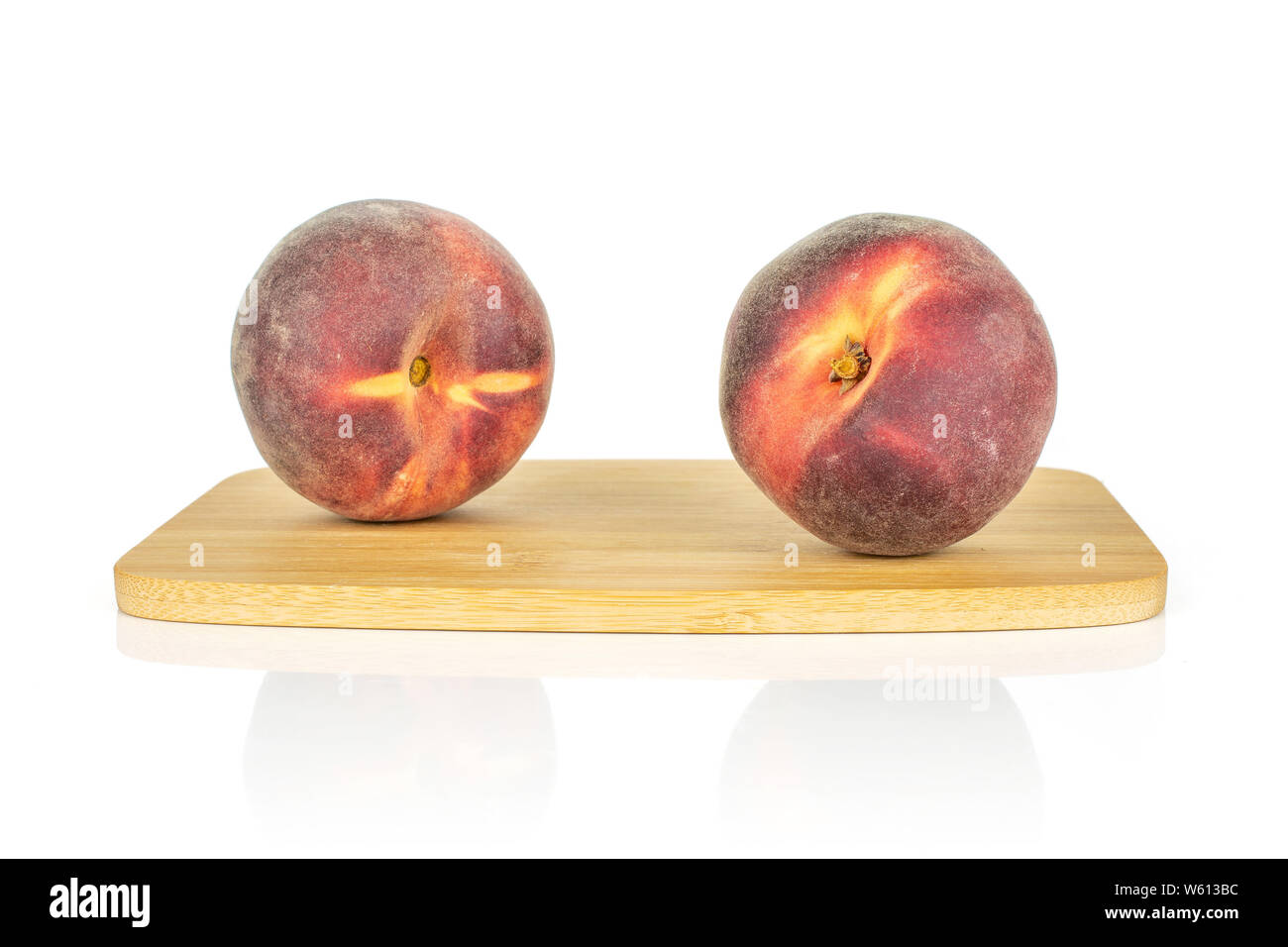 Group of two whole fresh red peach isolated on white background Stock ...