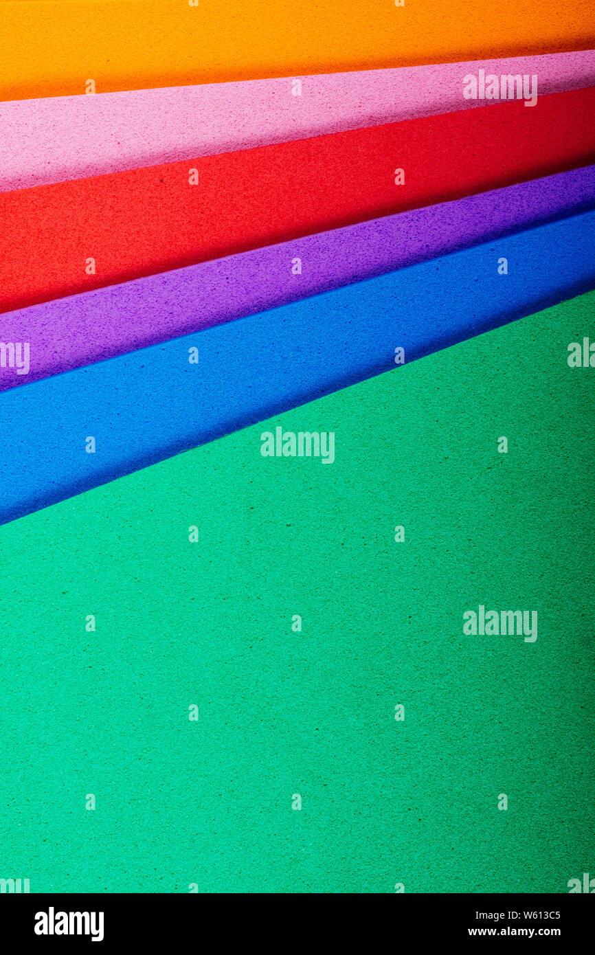 Colorful objects make mixed multi color background Stock Photo - Alamy