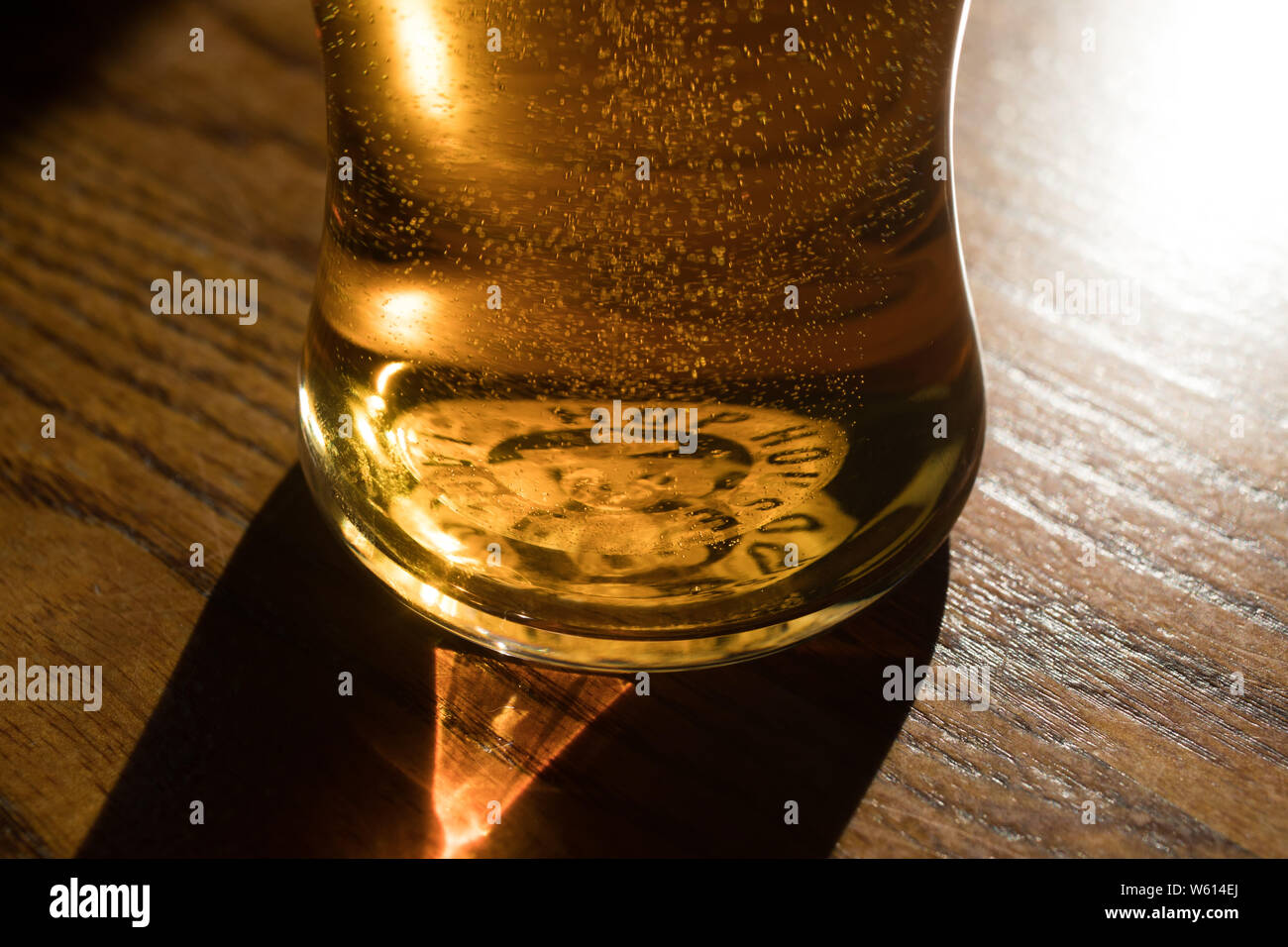 Glass of lager in the sun hi-res stock photography and images - Alamy