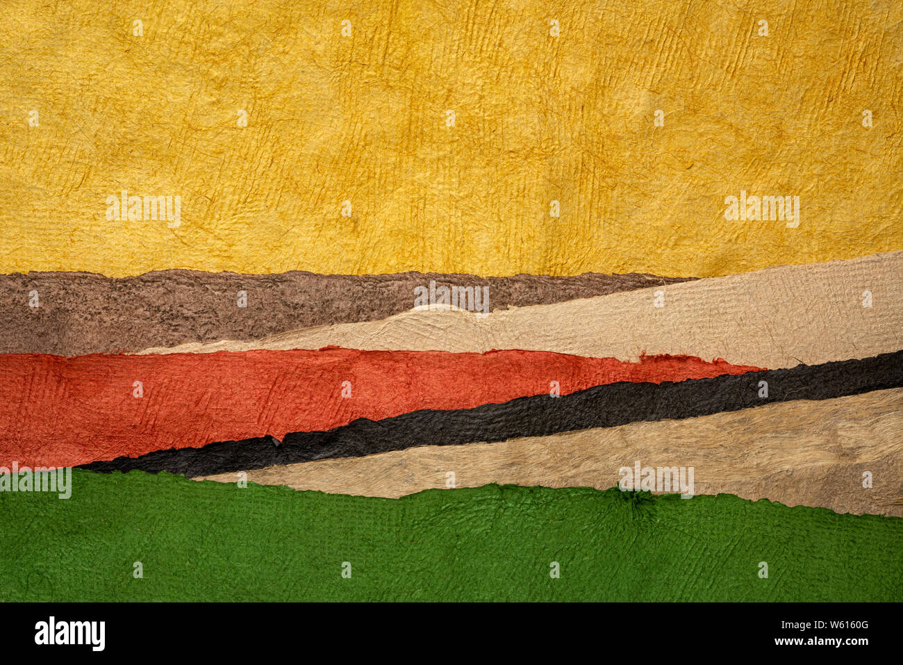 abstract landscape created with sheets of textured colorful handmade ...