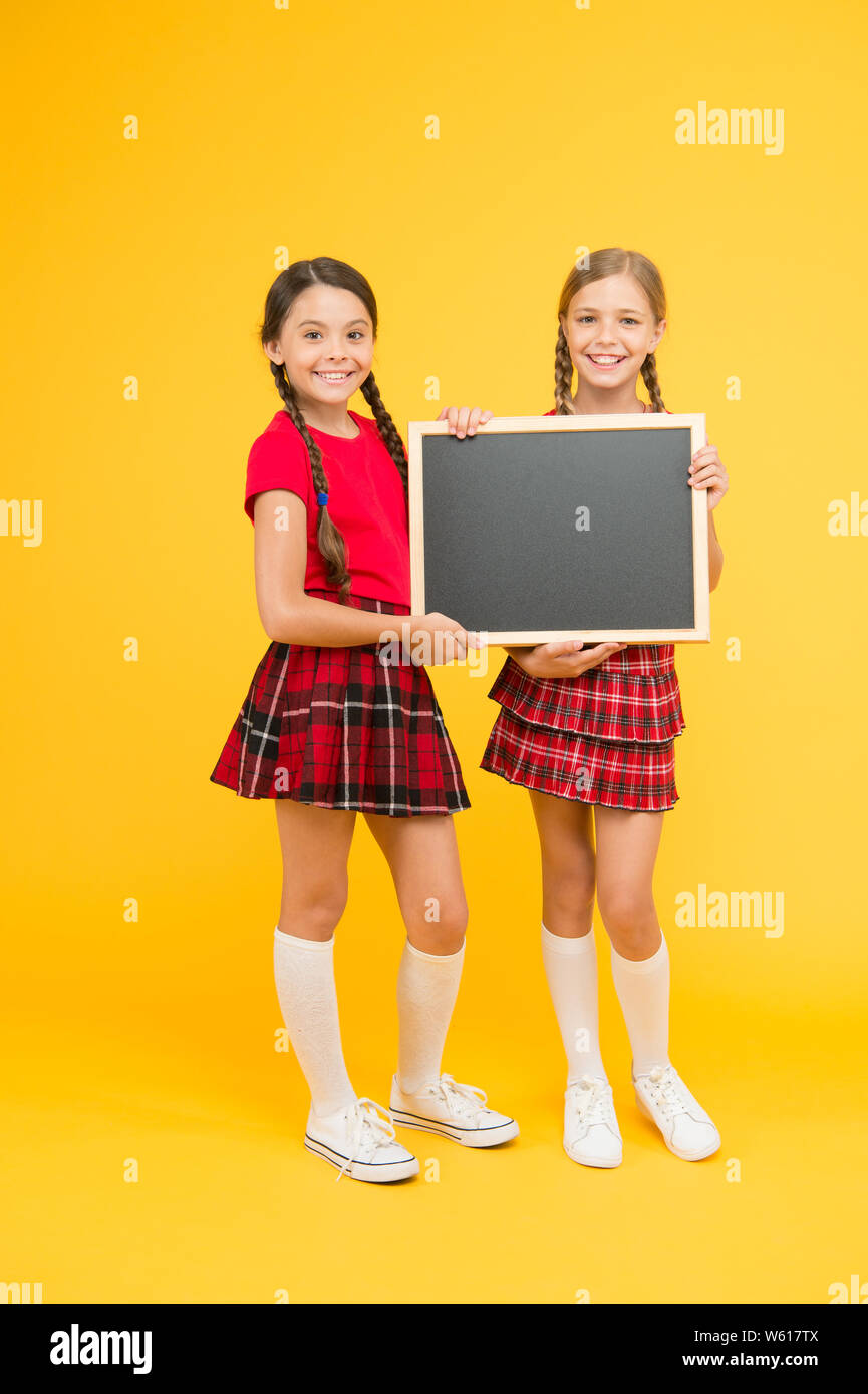 Cheerleading classes. School girls cute pupils red uniform hold ...