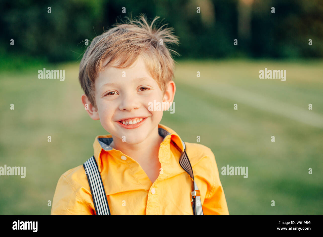Closeup portrait of funny cute adorable nice smiling blond white ...