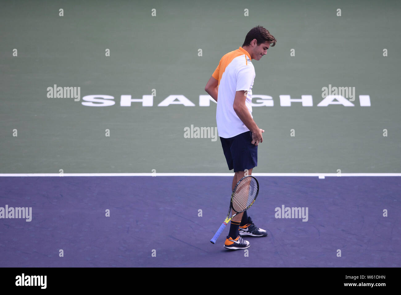 Taylor Harry Fritz of the United States reacts as he competes against ...