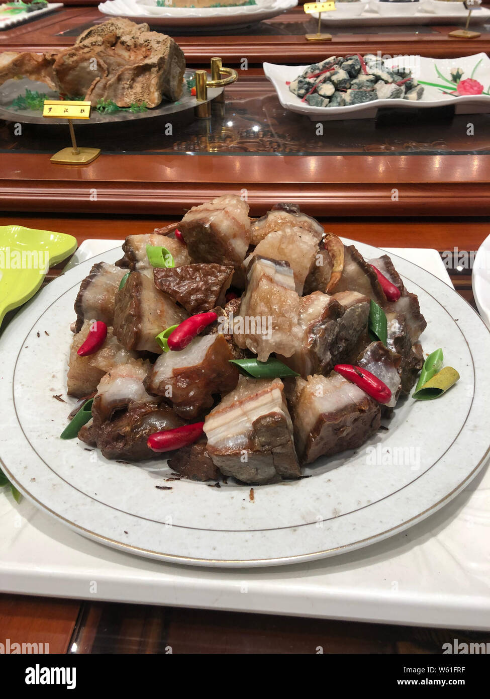 Colorful stones resembling a banquet of dishes are on display at the ...