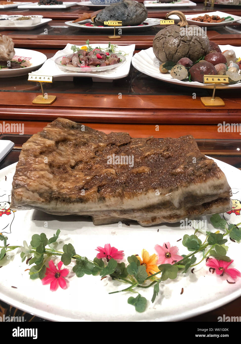 Colorful stones resembling a banquet of dishes are on display at the ...