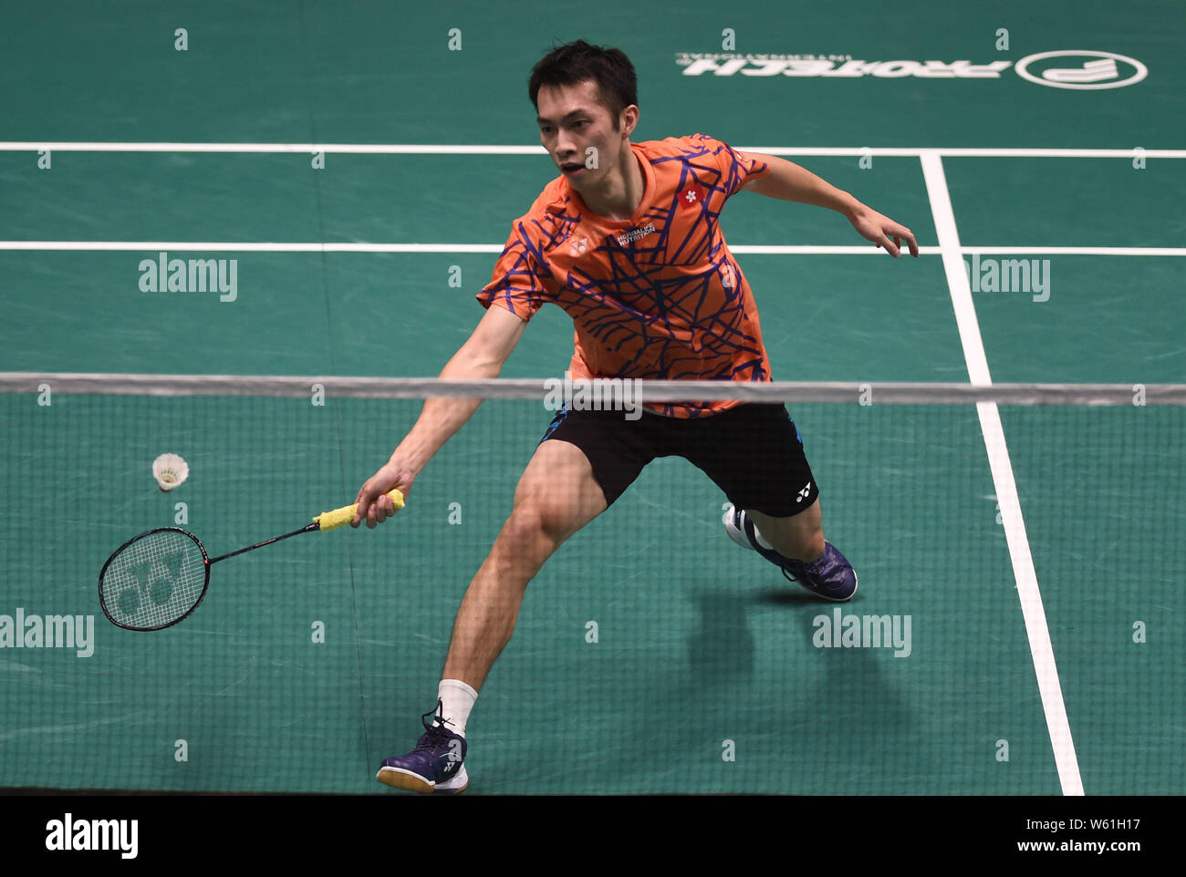 Angus Ng Ka Long of China returns a shot to Chico Aura Dwi Wardoyo of ...