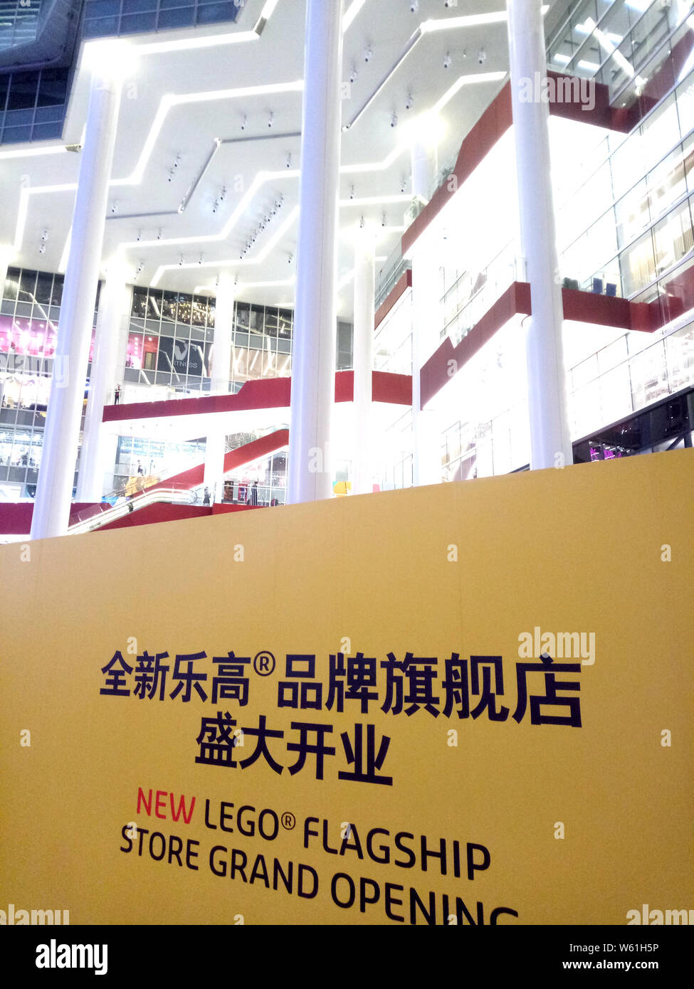 People visit the Lego Flagship store at Shanghai ShiMao Festival City ...