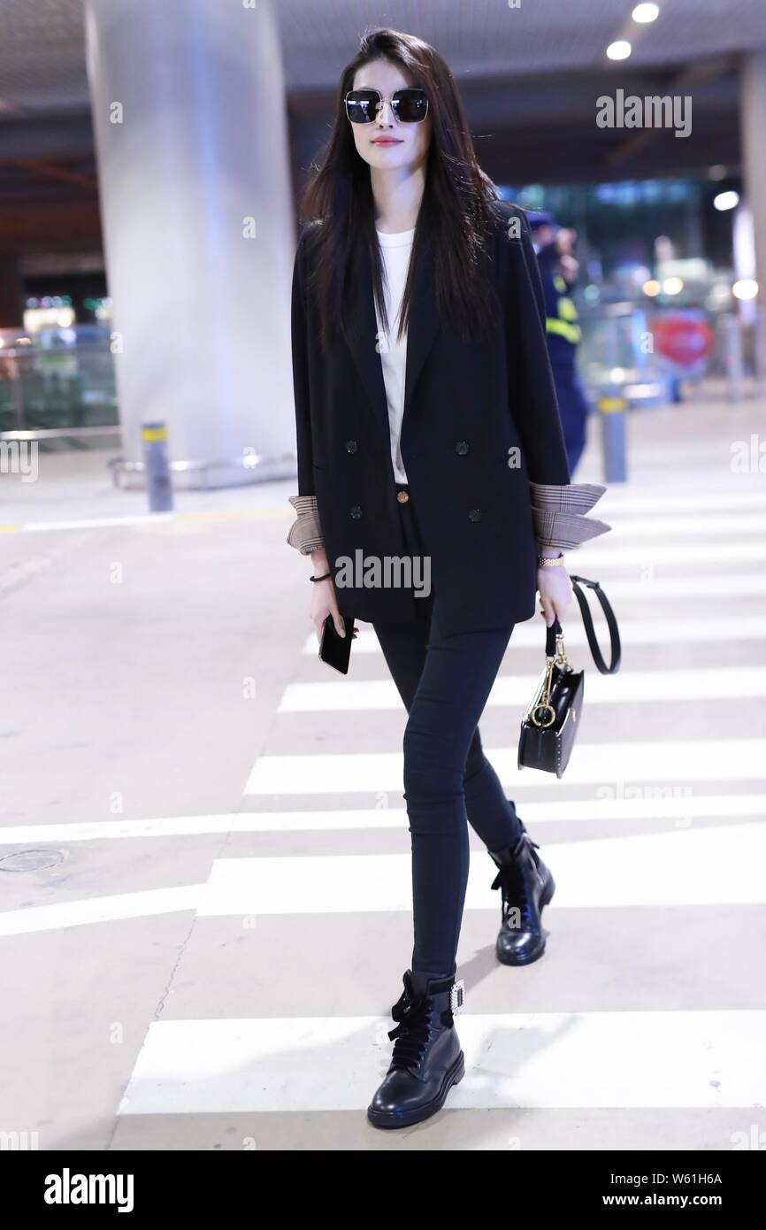 Chinese supermodel He Sui is pictured at an airport in Shanghai, China ...