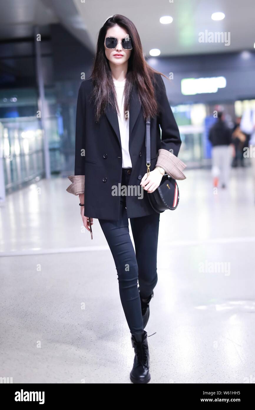 Chinese supermodel He Sui is pictured at an airport in Shanghai, China ...