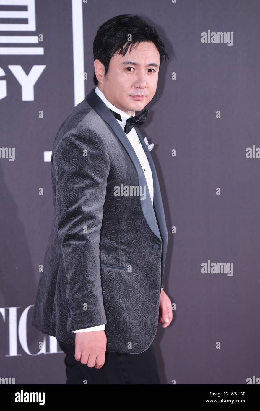 Chinese actor Shen Teng arrives on the red carpet for the L'Officiel ...