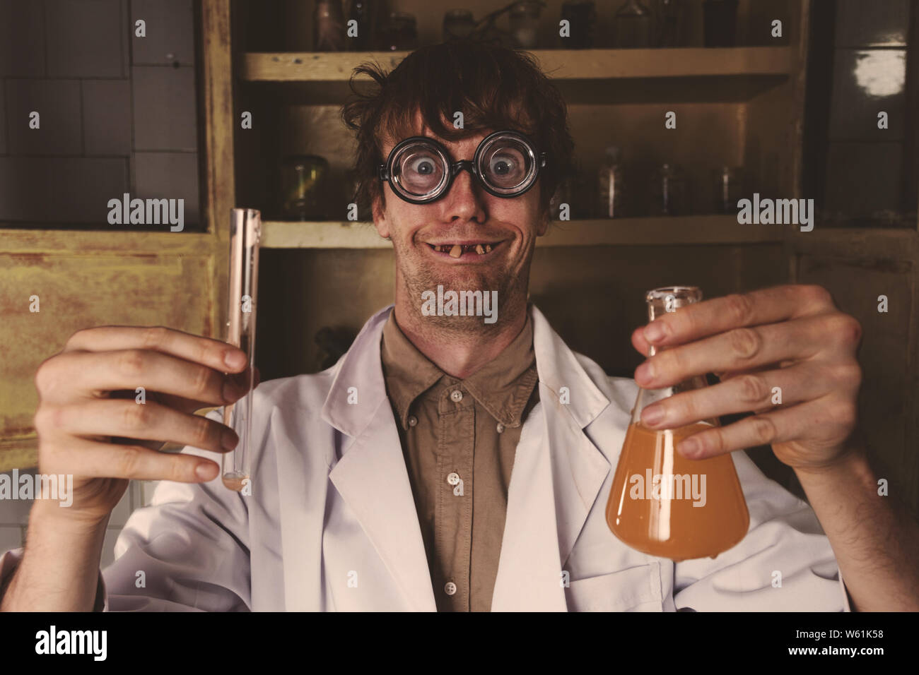Crazy scientist in his lab doing experiments Stock Photo - Alamy