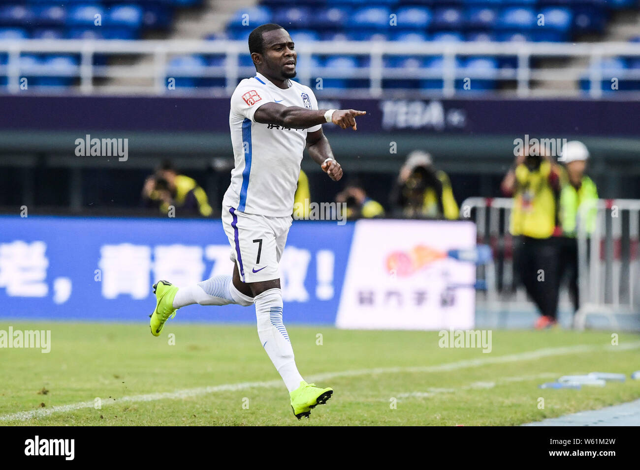 Ghanaian football player Frank Acheampong of Tianjin TEDA celebrates ...
