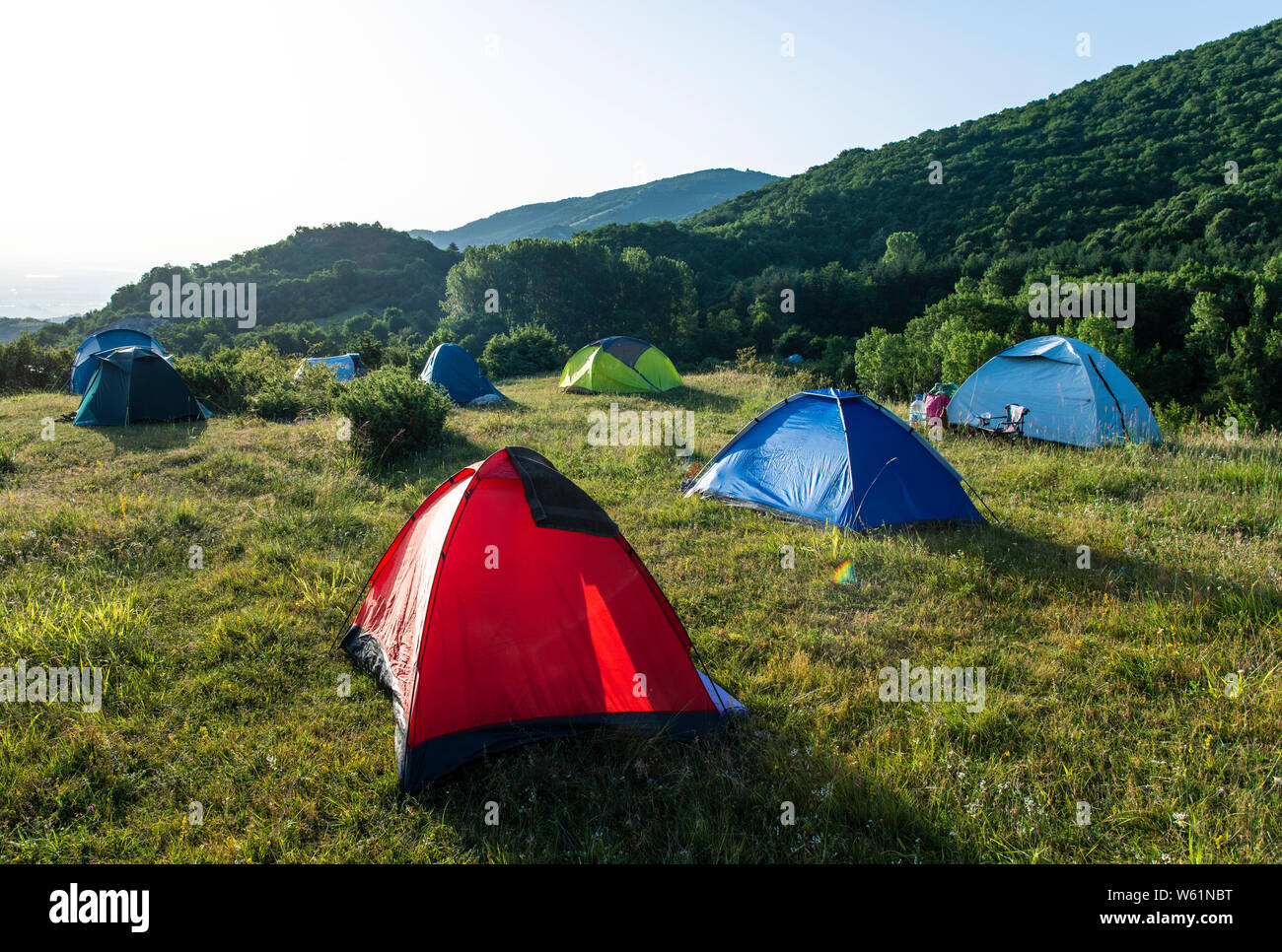 Many tents in the mountain.. Outdoor concept. Sunshine morning in the ...