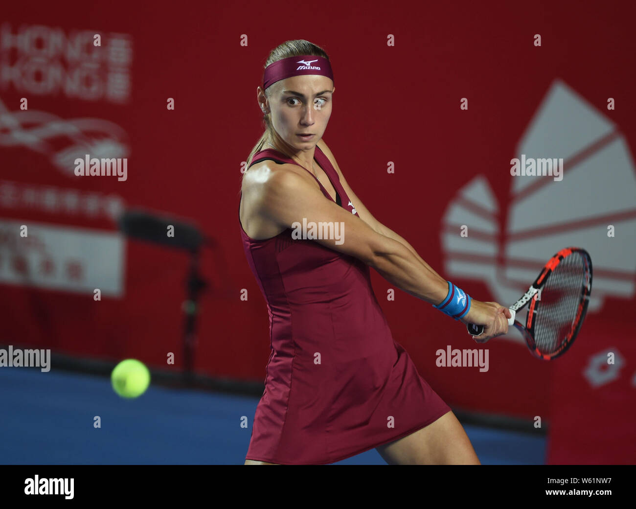Aleksandra Krunic of Serbia returns a shot to Zheng Saisai of China in ...