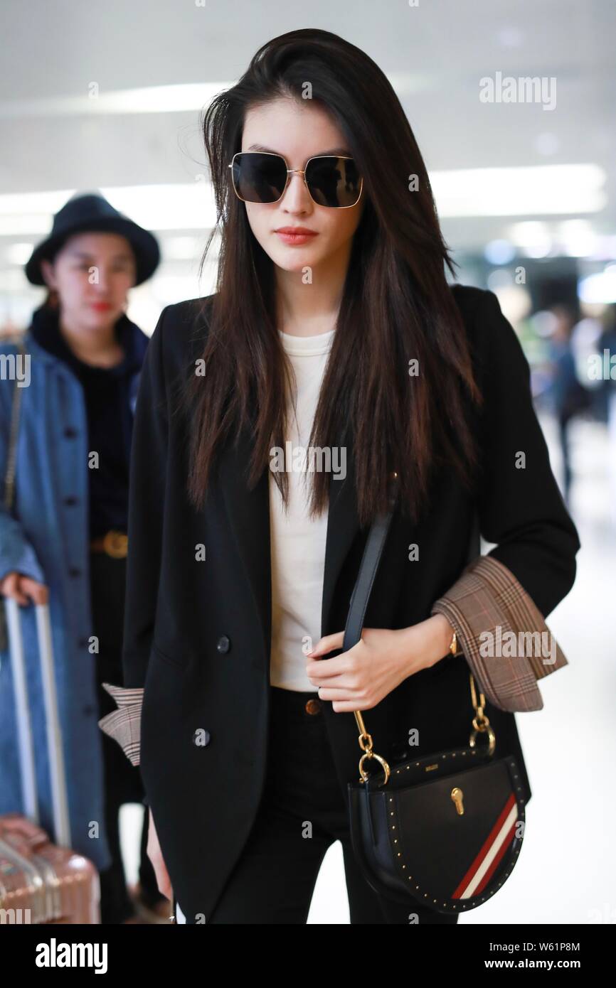 Chinese supermodel He Sui is pictured at an airport in Shanghai, China ...
