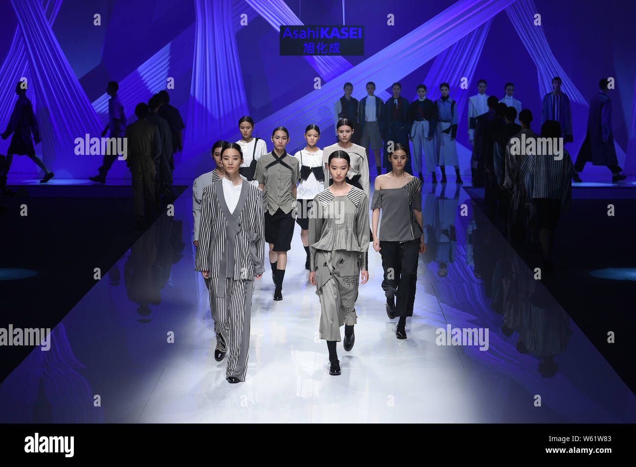 Models display new creations at the fashion show of Asahi Kasei Future ...