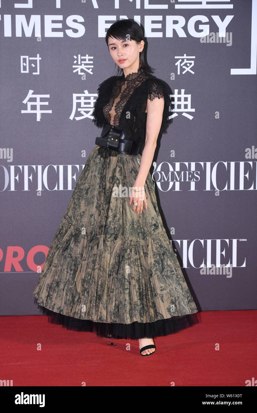 Chinese actress Olivia Wang or Wang Ziwen arrives on the red carpet for ...