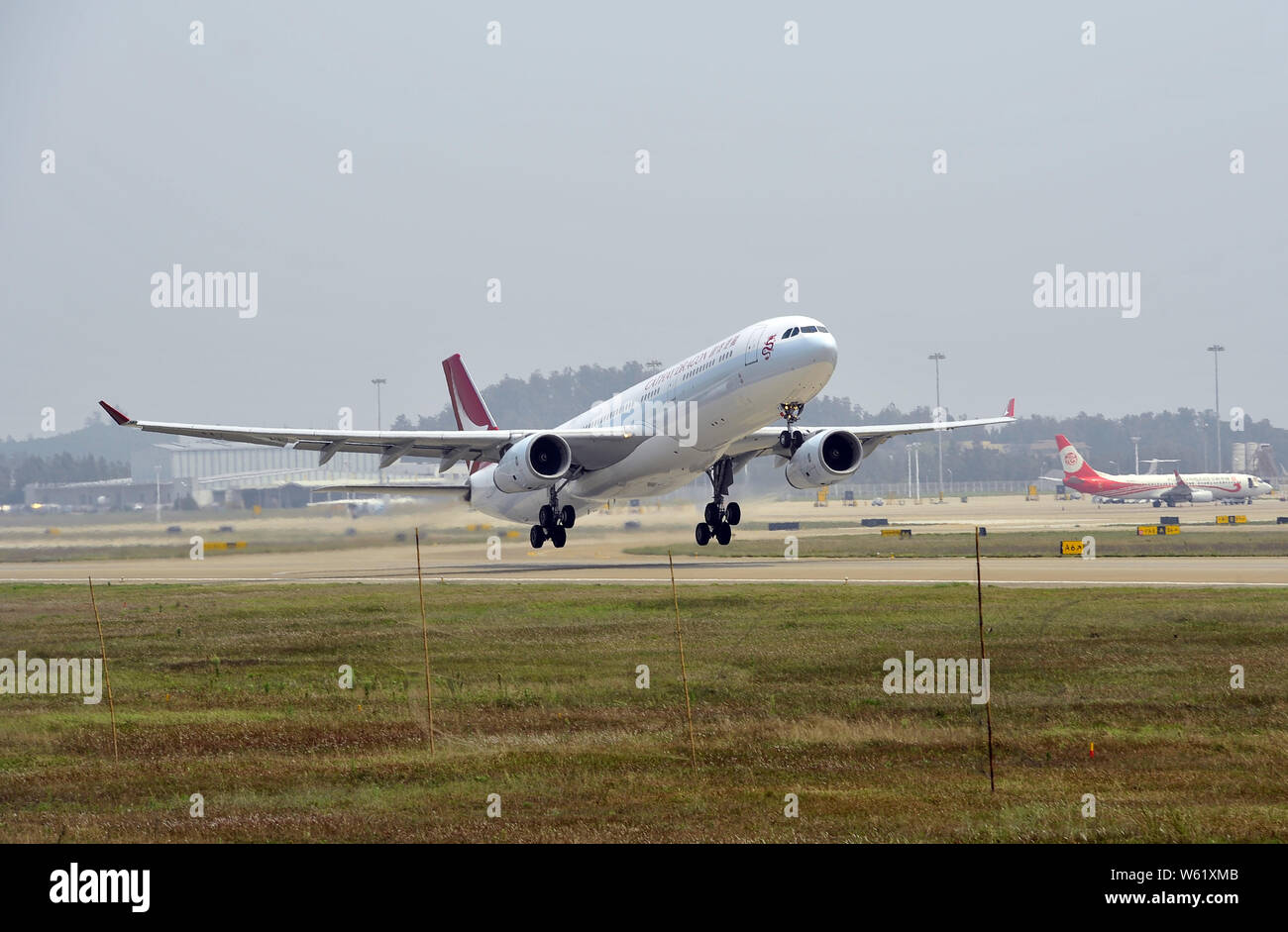 --FILE--An Airbus A330-343 jet plane of Cathay Dragon is pictured at ...