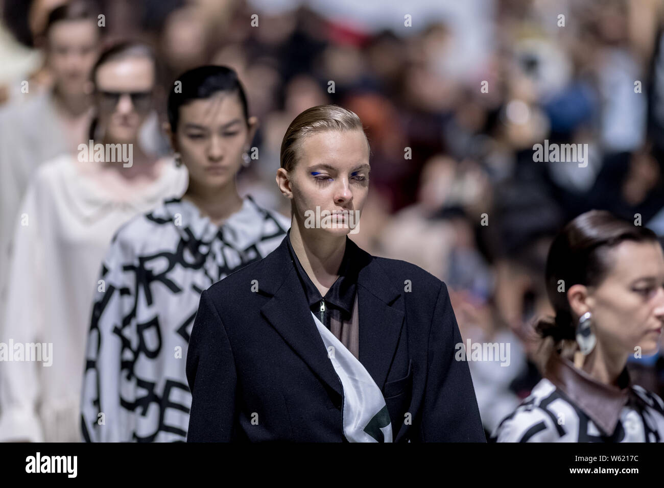 A model displays a new creation at the fashion show of IMMI during the ...