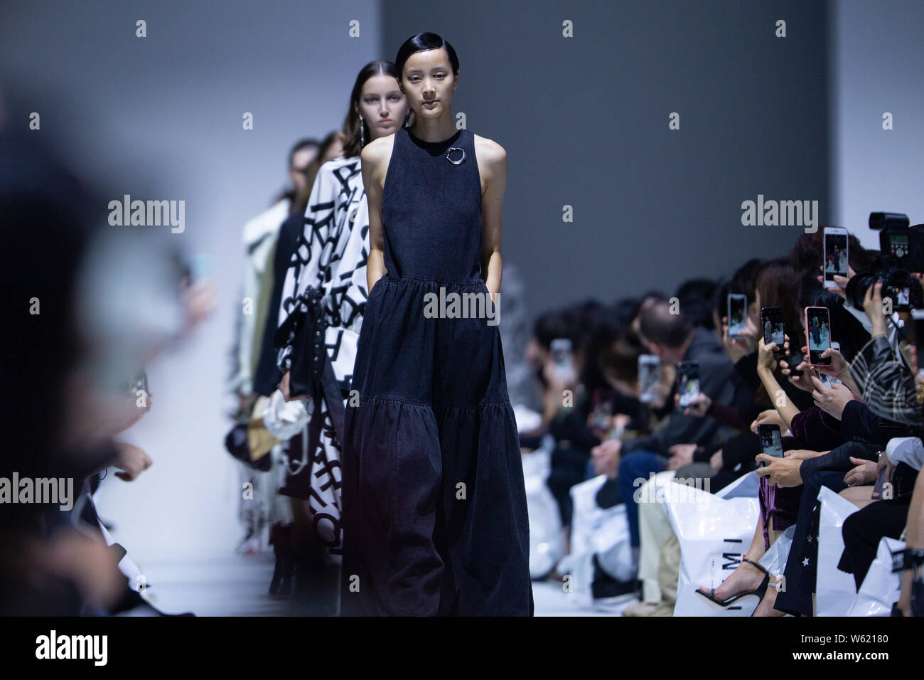 A model displays a new creation at the fashion show of IMMI during the ...