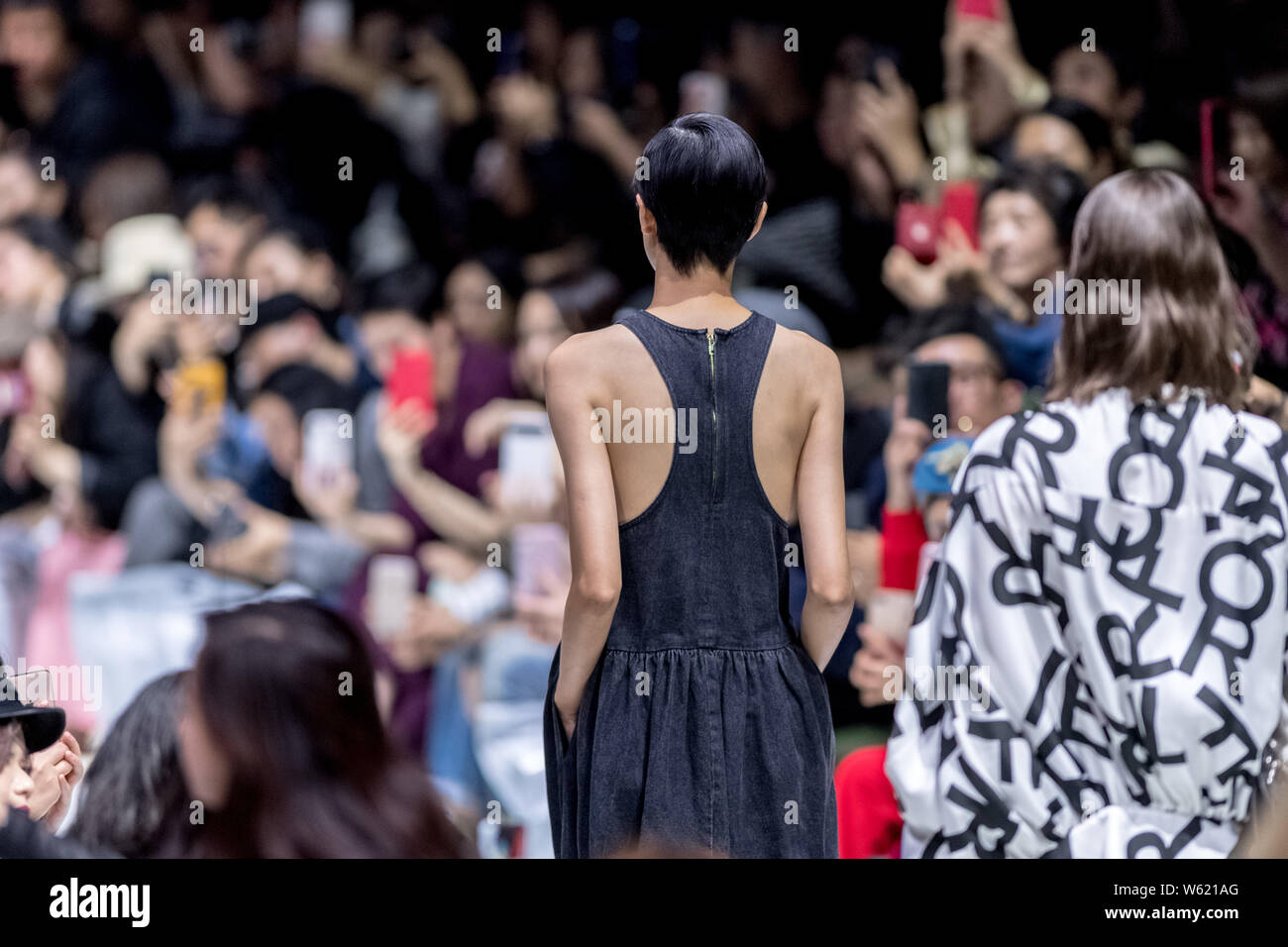 Chinese model Pei Bei displays a new creation at the fashion show of ...