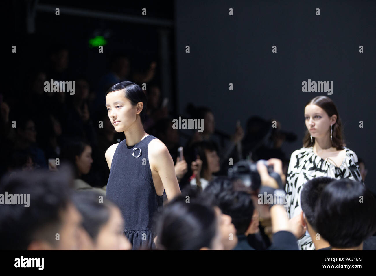 Chinese model Pei Bei displays a new creation at the fashion show of ...