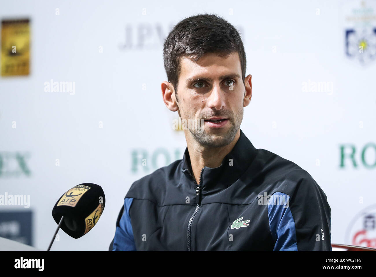 Novak Djokovic of Serbia attends a press conference after defeating ...