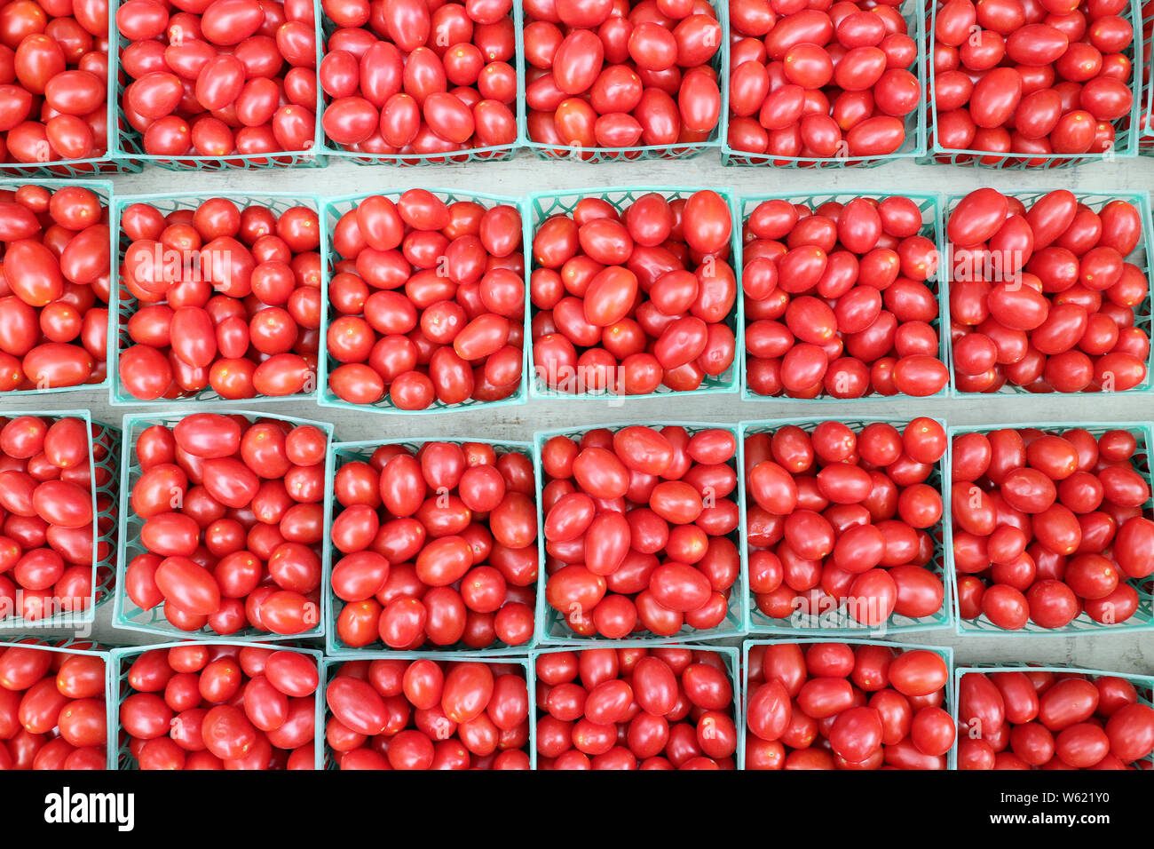 red grape tomato in case at market place Stock Photo - Alamy
