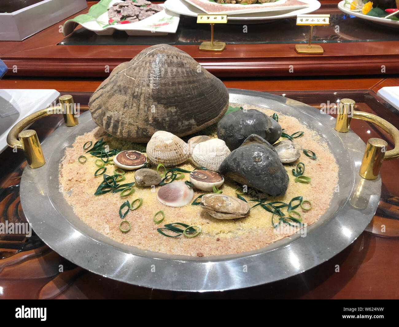 Colorful stones resembling a banquet of dishes are on display at the ...