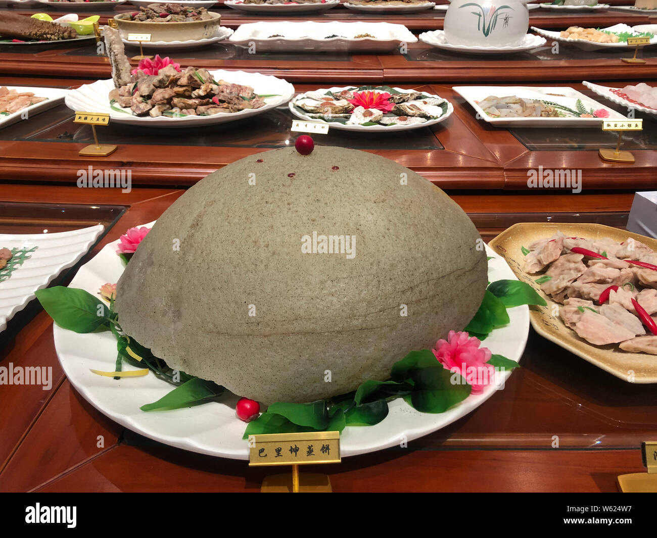 Colorful stones resembling a banquet of dishes are on display at the ...