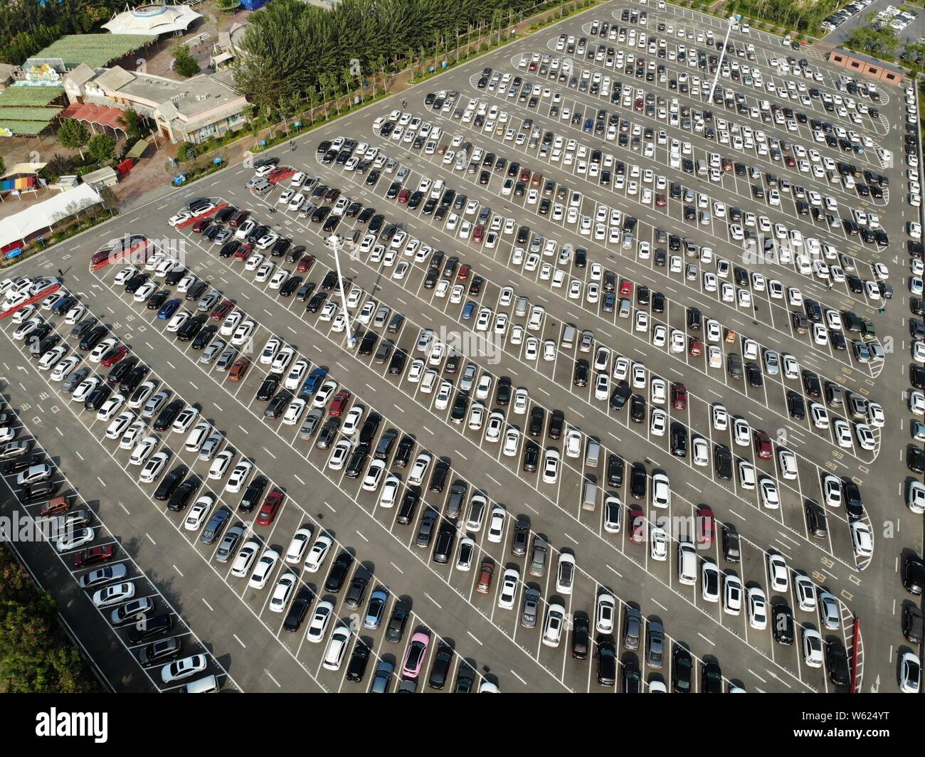 An aerial view of the parking area nearly full of holidaymakers' cars ...
