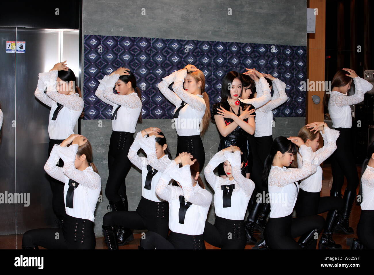 South Korean singer Kim So-ya, center, known momonymously as Soya ...