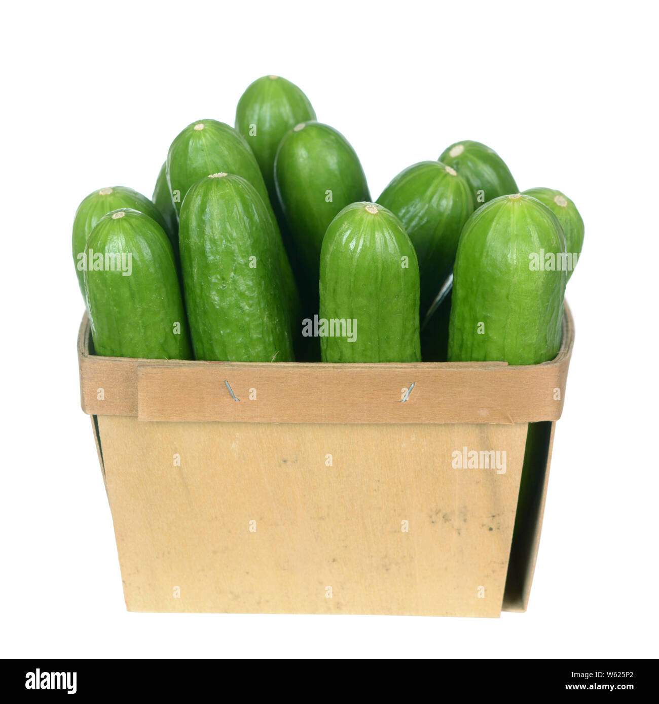 cucumbers in wooden bucket isolated on white background Stock Photo - Alamy