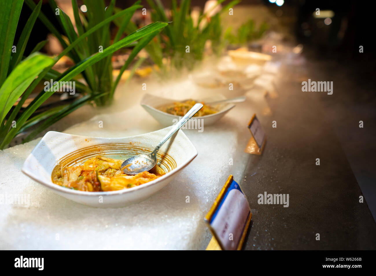 Delicious asian japanese style starter cold snacks sushi buffet table ...