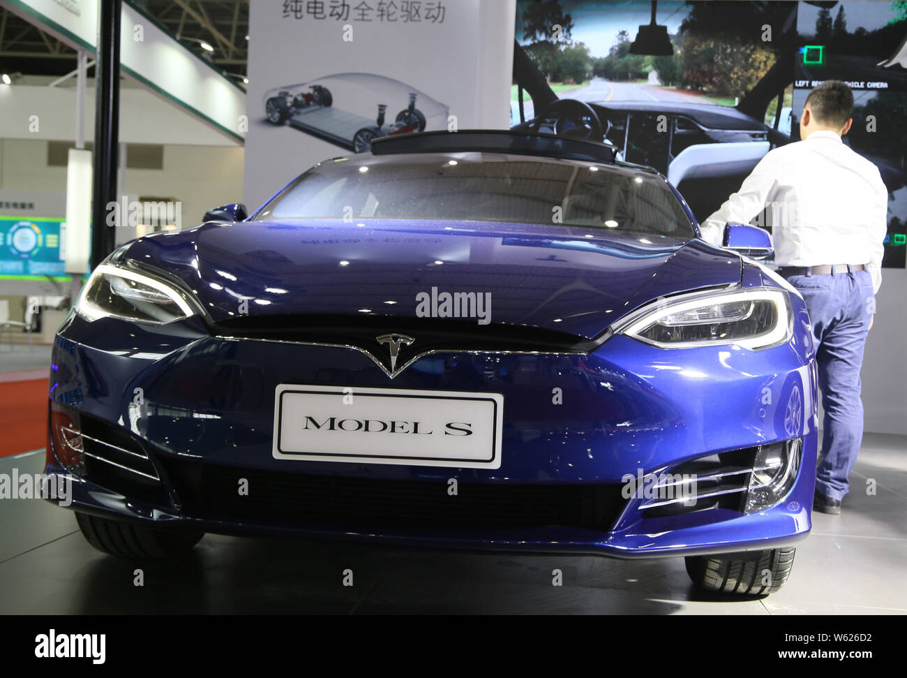 --FILE--A Tesla Model S electric car is on display during an automobile ...