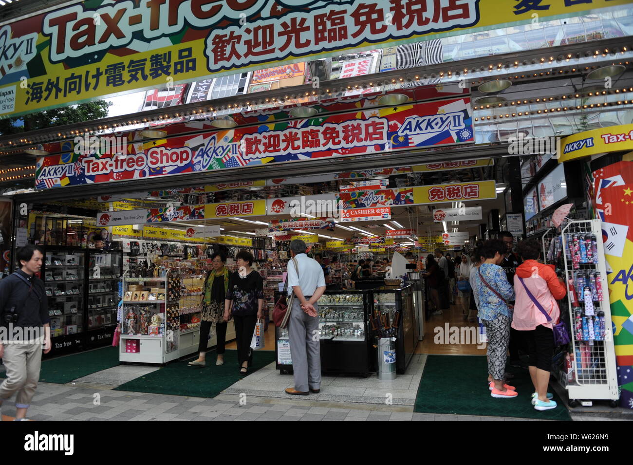 --FILE--Chinese customers shop at the AKKY II Tax-free Shop in ...