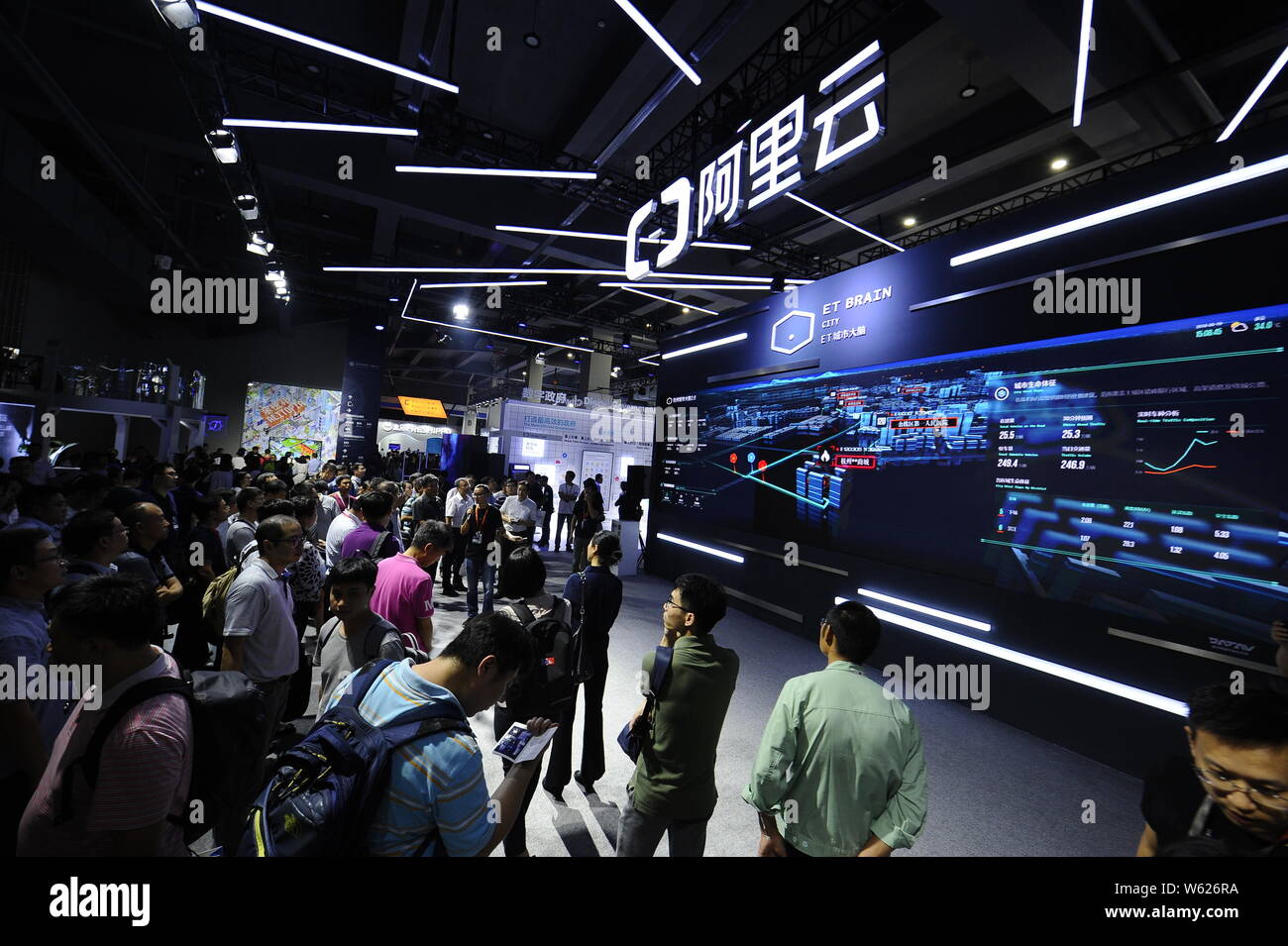 --FILE--People visit the stand of Alibaba Cloud, or Aliyun.com, the ...