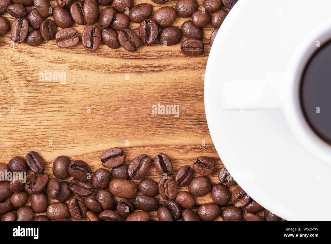 A cup of coffee and scattered coffee beans. Layout. Flat lay. Coffee ...