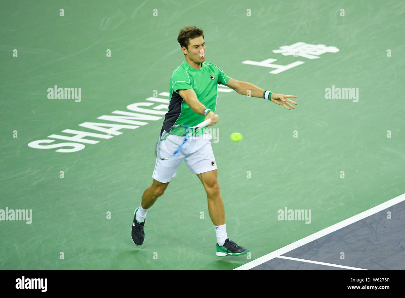 Matthew Ebden of Australia returns a shot to Borna Coric of Croatia in ...