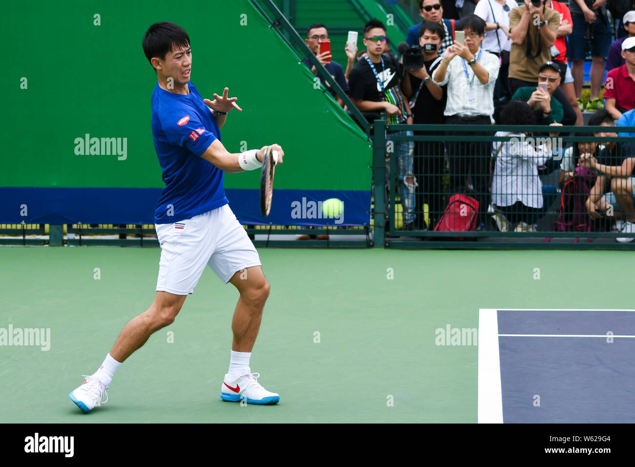 Japanese tennis player Kei Nishikori takes part in a training session ...