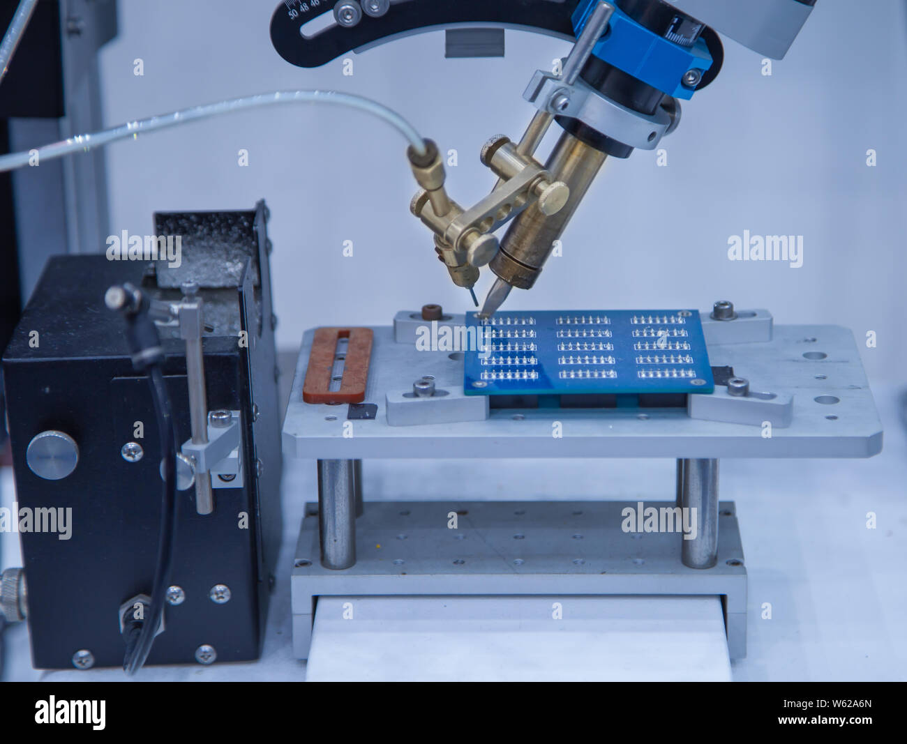 Automated robot soldering electronic PCB circuit board Stock Photo - Alamy