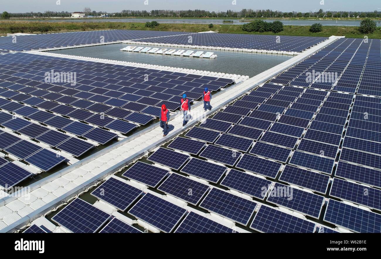 Aerial view of a floating solar energy farm at a photovoltaic power ...