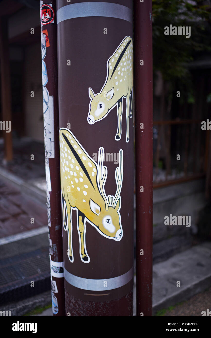 Deer stickers on street post, Nara, Japan Stock Photo - Alamy