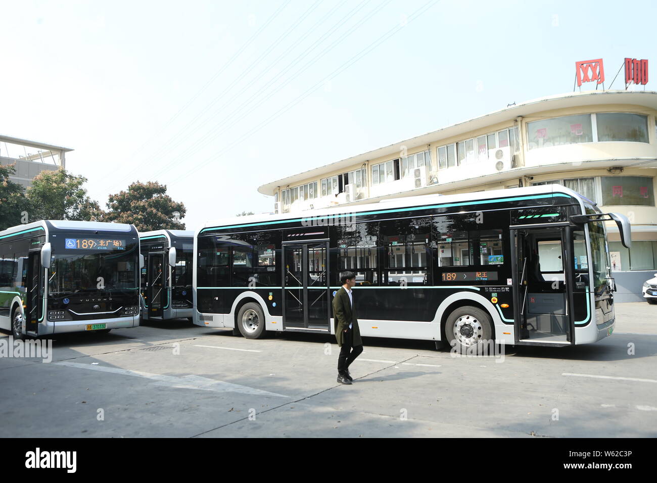Smart buses, named "Black King Kong" are seen at a bus station in ...