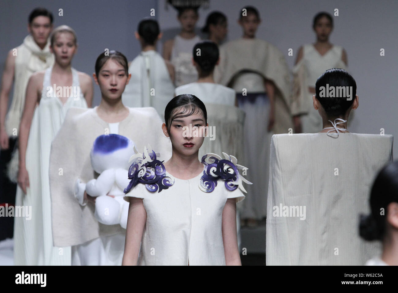 Models display new creations at the fashion show of A NIU A GA during ...