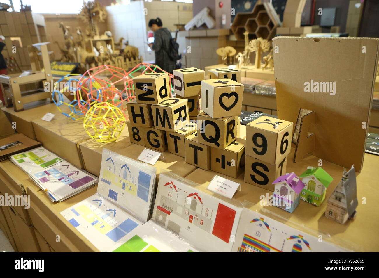 Different creative products made out of cartons are displayed in ...