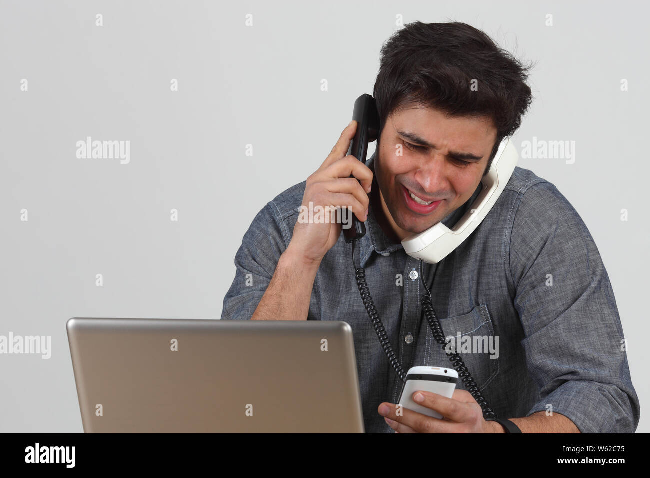 Mobile phones multiple hi-res stock photography and images - Alamy