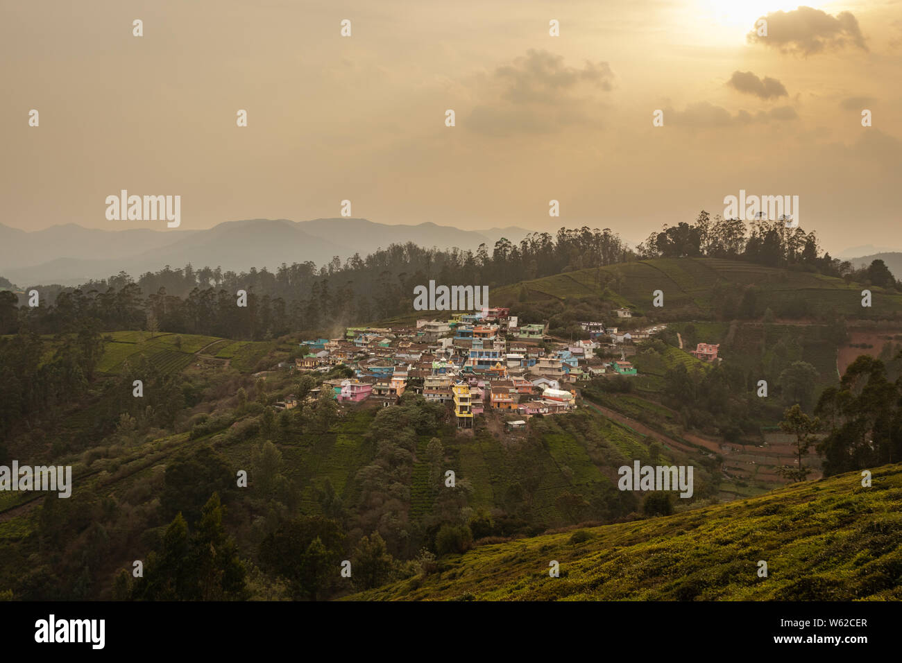 small village on hill top with green forest of western ghat image is ...