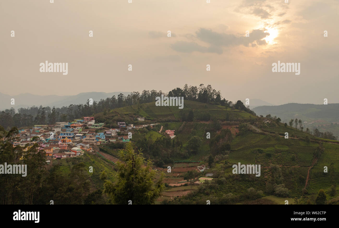 small village on hill top with green forest of western ghat image is ...