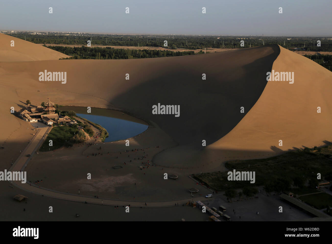 View of the Crescent Moon Lake, also known as Yueya Spring, surrounded ...